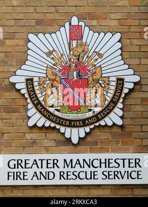 Greater Manchester Fire and Rescue Service logo badge Stock Photo - Alamy