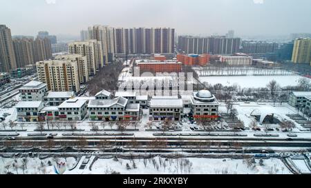 Snowscape of waterfront city, aerial photo Stock Photo - Alamy