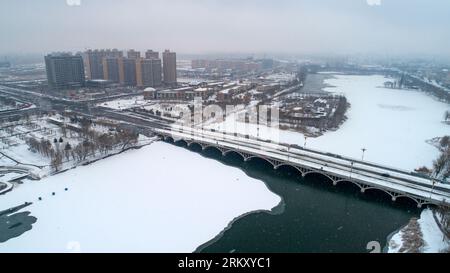 Snowscape of waterfront city, aerial photo Stock Photo - Alamy