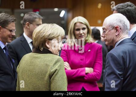 German Chancellor Angela Merkel (R) and Danish Prime Minister Helle ...