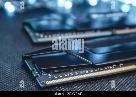 DDR4 DRAM memory modules in blue light. Computer RAM chipset close-up ...