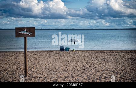 danger sharks seascape sign Stock Photo - Alamy