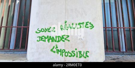 "Be realistic, ask for the impossible", Political graffitis, Lyon ...