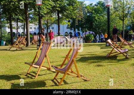 Copenhagen, Denmark - August 8, 2023: Fabric hammocks in the gardens of ...