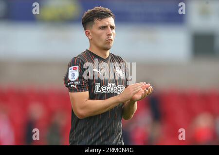 Albie Morgan #8 of Blackpool applauds the travelling fans after the ...