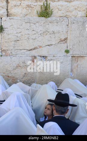 A 28 year-old Orthodox Jewish mother shows off her 3 day-old baby ...
