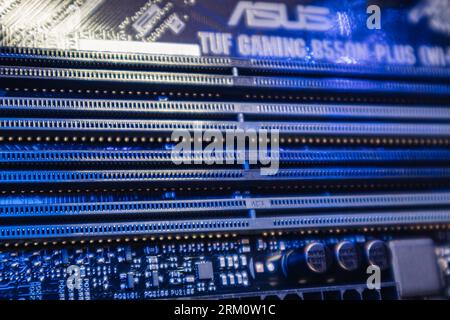 Blue DDR RAM memory slots sockets on motherboard close-up, desktop PC ...