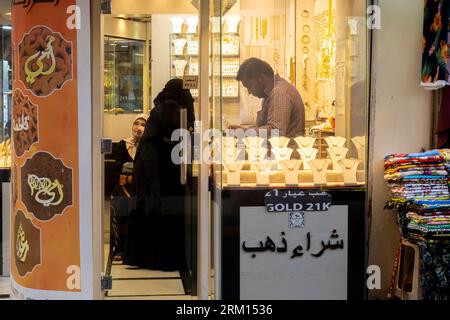 Bahraini women in a gold shop, Manama souk, Kingdom of Bahrain Stock ...