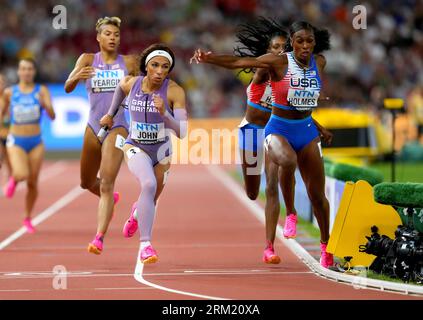 Great Britain's Yemi Mary John (left) runs the final leg of the 4x400m ...