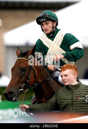 Asian Daze ridden by jockey Danny Sheehy on their way to winning the ...