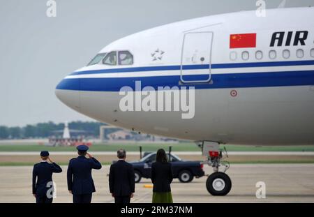 A plane carrying Chinese President Xi Jinping and his wife Peng Liyuan ...