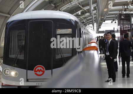 Shanghai metro line 11 train emerges from a tunnel near the motor ...