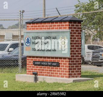 Fulton County Sheriff Patrick Labat surveys the scene in front of the ...
