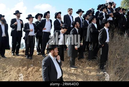 Ultra orthodox Jewish yeshiva students at an urban school build a tower ...