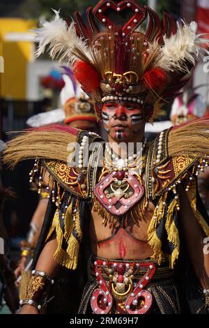 Indonesian with a traditional costume from south sulawesi at BEN ...