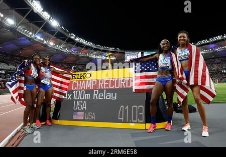 Twanisha Terry, from the United States, carries teammate Sha'Carri ...