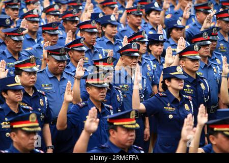 (140110) -- QUEZON CITY, Jan. 10, 2014 (Xinhua) -- Newly-promoted ...
