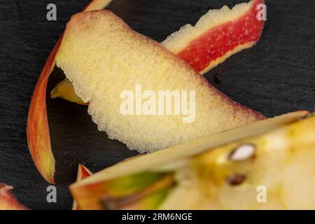 the flaccid peel of a peeled apple on the table, the peel of peeled ...