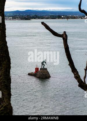 A statue of Tangaroa, the Maori god of the sea, in Tauranga Harbour, New Zealand. In the ...