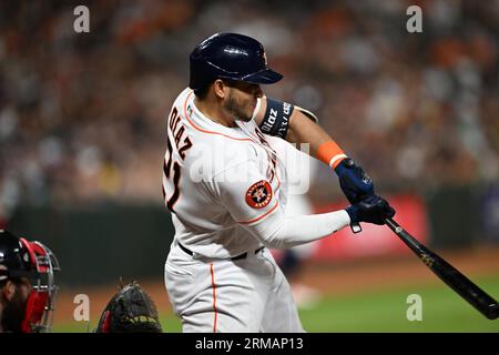 Houston Astros' Yainer Diaz hits a solo home run against the Seattle ...