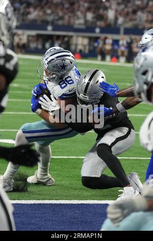 Dallas Cowboys tight end Luke Schoonmaker signs autographs during ...