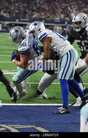 Dallas Cowboys tight end Luke Schoonmaker waits in a tunnel to take the ...