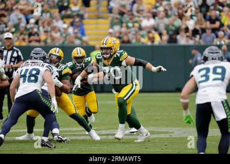 Green Bay Packers guard Royce Newman (70) walks on the field before an ...