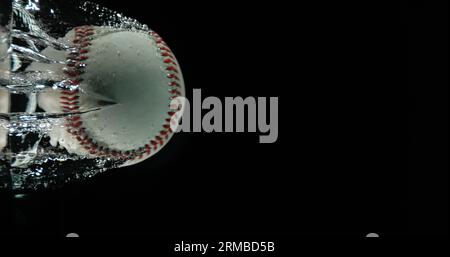 Baseball's Ball Falling into Water against White background Stock Photo ...
