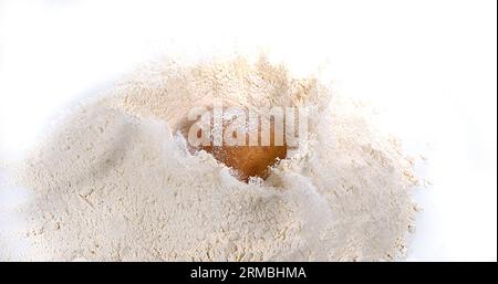 Bread Falling in Flour against White Background Stock Photo - Alamy