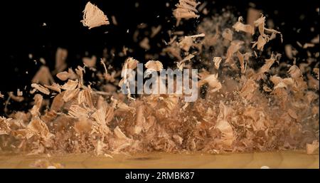 Wood Chips Falling on a Board Stock Photo - Alamy