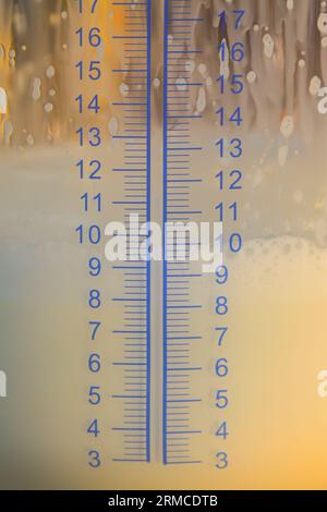 Ml scale on a glass milk storage tank, closeup of photo Stock Photo - Alamy