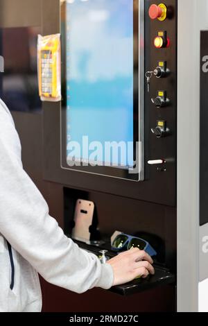 Professional CNC Laser Machine Operator Performing Equipment Cutting ...