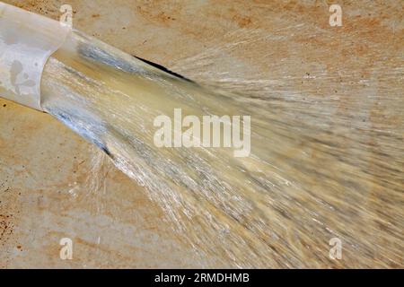 closeup of photo plastic water outlet in a farm Stock Photo - Alamy
