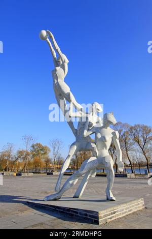women's volleyball movement sculpture, under the blu sky Stock Photo ...