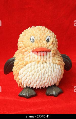 penguin model crafts in a market, made of shells Stock Photo - Alamy