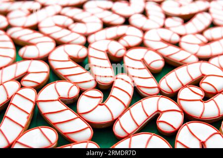 A lot of gingerbread candy cane shaped cookies, flat lay Stock Photo ...