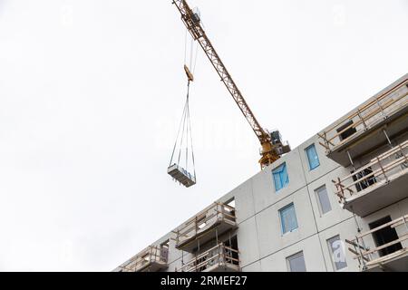 A construction site, Uppsala, Sweden. An apartment building are being ...