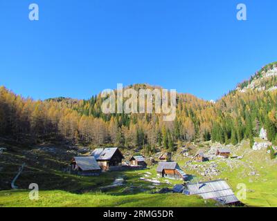 Meadow with traditional shepard huts architecture at Vogar alpine ...