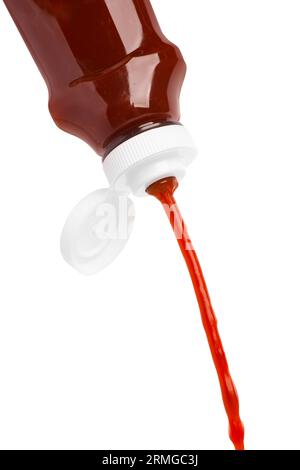 Pouring tasty red ketchup from bottle isolated on white Stock Photo - Alamy