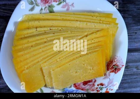Slices of Egyptian Rumi cheese, also called gebna romiya or gebna ...