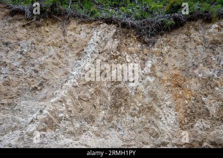 Volcanic debris and ash deposits on a road cut. Sumatra, Indonesia ...