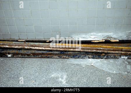 A disassembled metal scaffold, a temporary structure constructed using ...