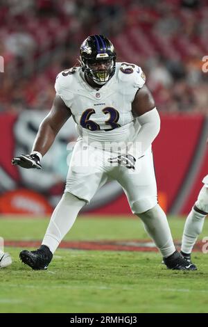 Baltimore Ravens guard Tykeem Doss (63) and fullback Ben Mason (38 ...