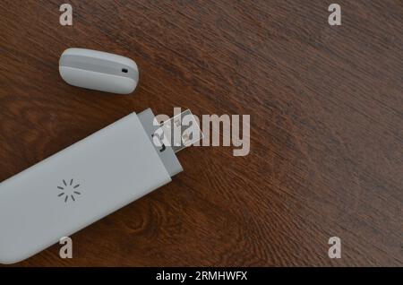 Latest generation USB 5G modem close for internet connection, allowing ...