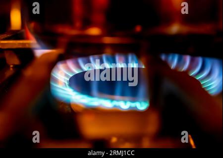 Natural gas burner at a cabin kitchen heating up a metal pot Stock ...