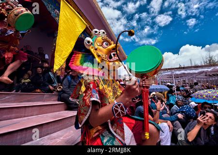 Masked monk and Tibetan drum at the Takthok Tsechu festival, Sakti ...