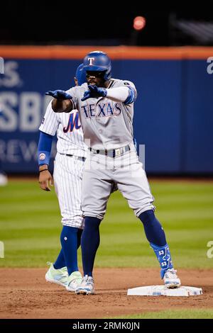 Texas Rangers' Marcus Semien, right, celebrates his home run with ...