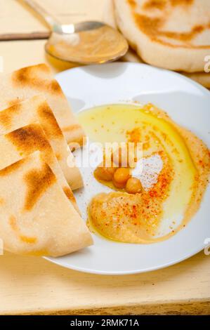 Traditional chickpeas Hummus with pita bread and paprika on top Stock ...