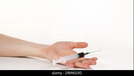 Medical Product Falling into Hand against White Background Stock Photo ...