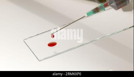 Blood dropping from Needle against White Background Stock Photo - Alamy